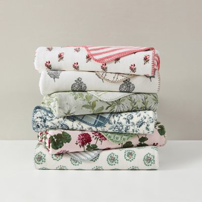 Click here for Laura Ashley Coco Plush Reversible Throw Collectio... prices