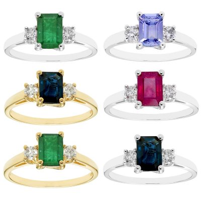 Click here for Three Stone Octogonal Ruby Ring with .20CT. T. W.... prices