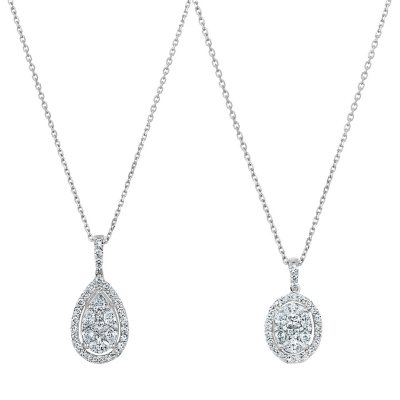 Click here for 0.60 CT. T. W. Diamond Halo Pendant in 14K White G... prices